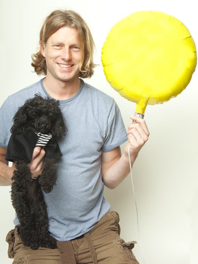Man, Dog and Yellow Balloon Stock Image - Image of friend, love: 23314015