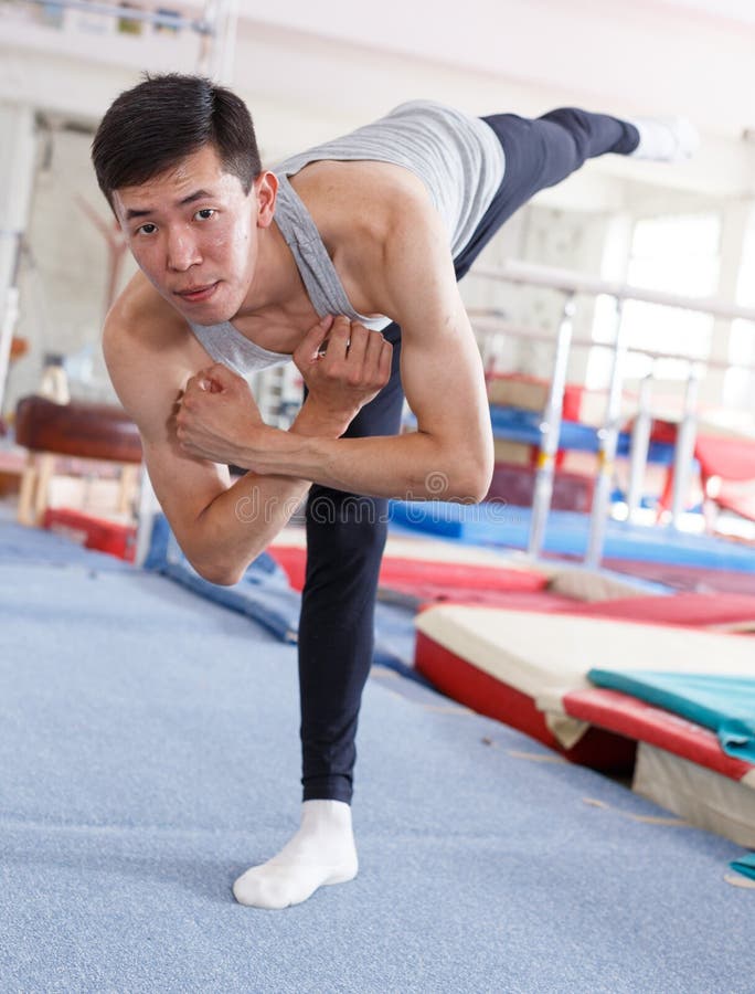 Man Doing Acrobatics Exercises Stock Image - Image of flexible, asian ...