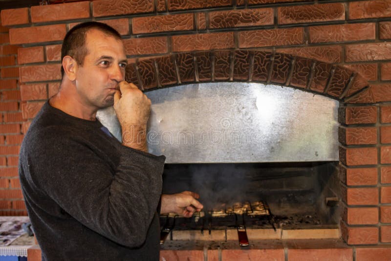 Boy doing barbecue stock photo. Image of help, happy - 74543518