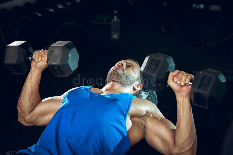Man doing bicep curls. stock photo. Image of human, health - 57783794