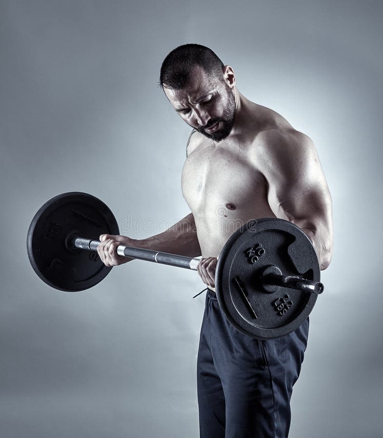 Man Doing Biceps Curl with Barbell Stock Image - Image of handsome ...