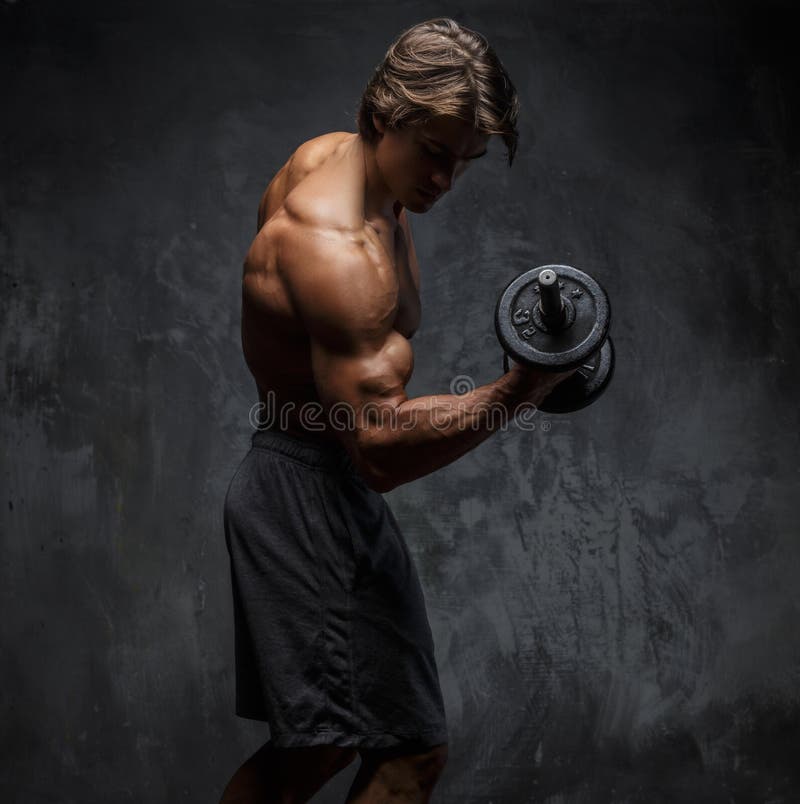 A Man Doing Biceps Exercise. Stock Image - Image of concentration ...