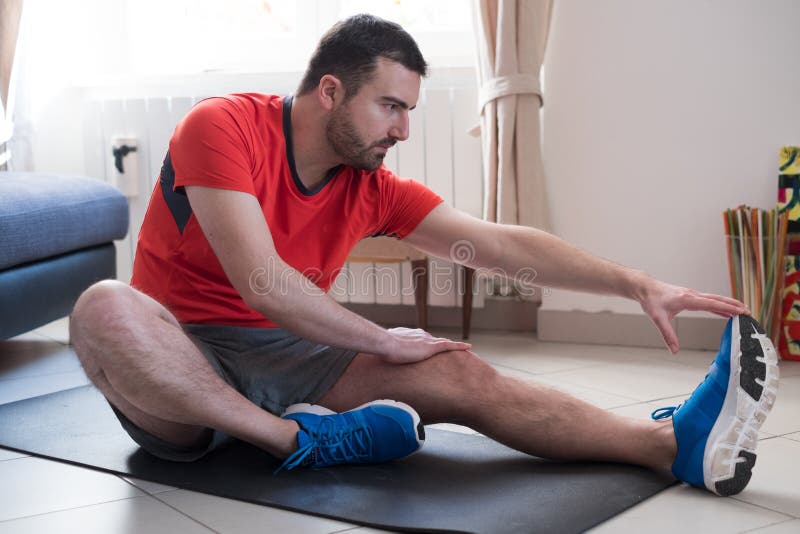 Man Doing Body Exercises and Working Out at Home Stock Image - Image of ...