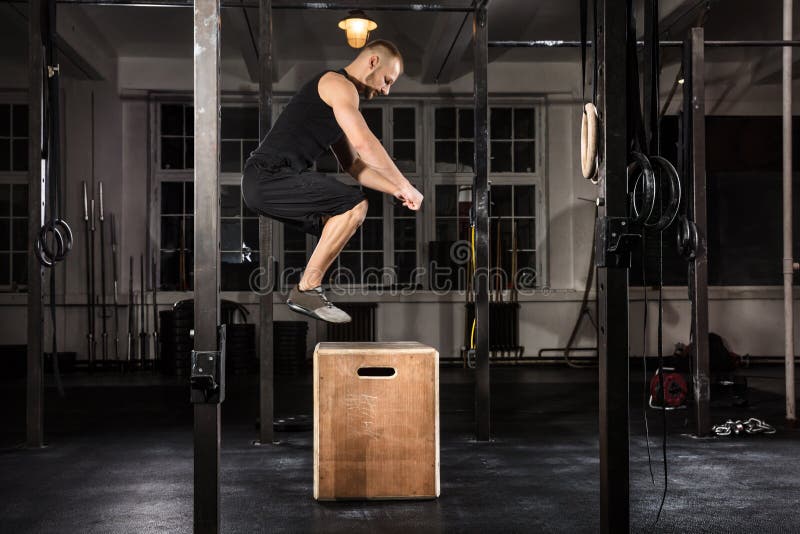 Man Doing a Box Jump Exercise Stock Image - Image of fitness, athletic ...