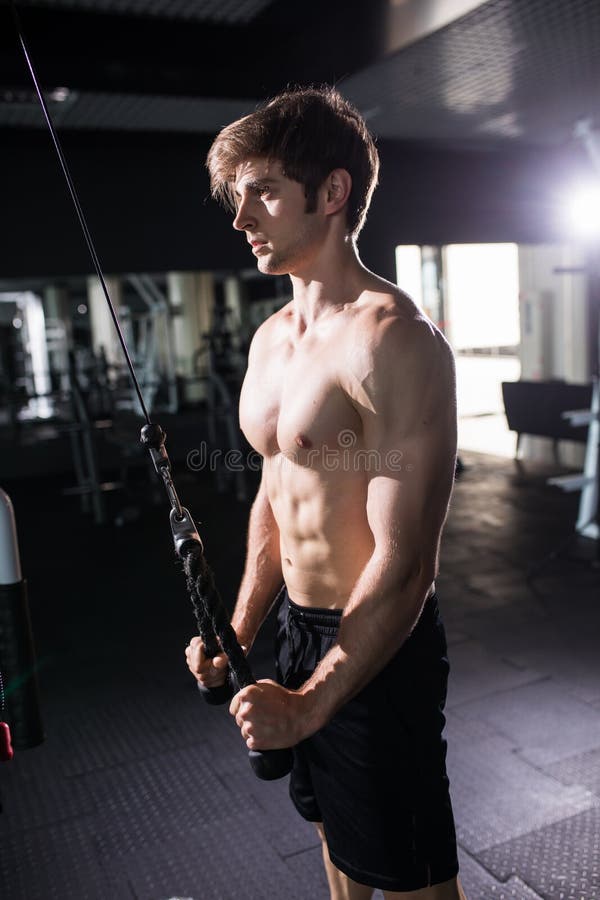 Man Doing Cable Fly Exercise in Gym in Fitness Hall Stock Image - Image ...