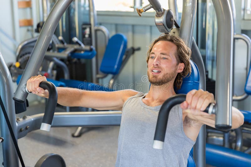 Man Doing Chest Exercises on Vertical Bench Press Machine Stock Photo ...