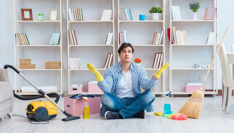 Man doing cleaning at home stock image. Image of furniture - 158105575