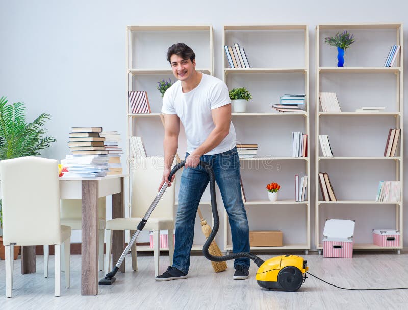 Man doing cleaning at home stock photo. Image of dusty - 177533738