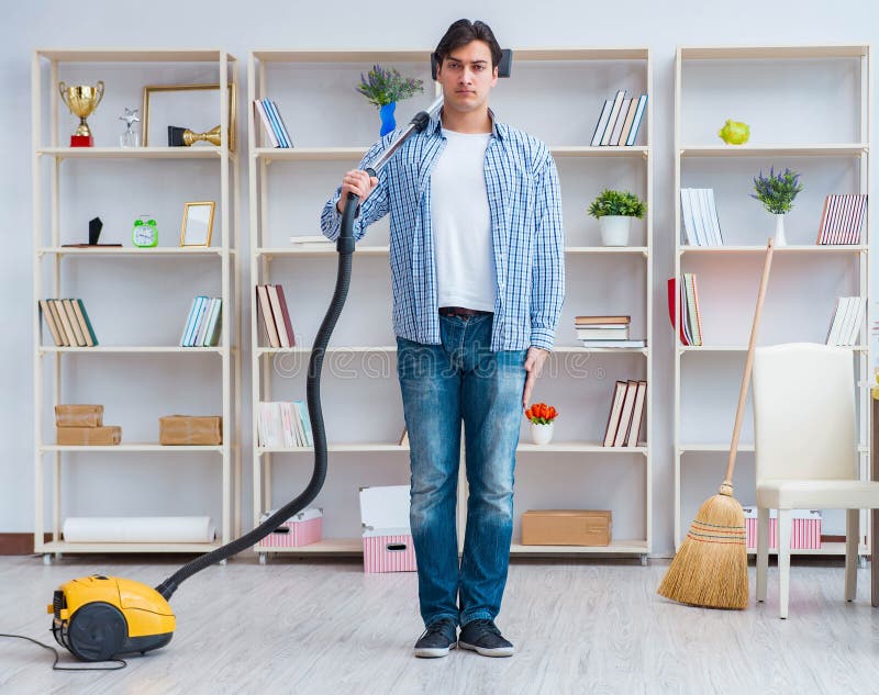 Man doing cleaning at home stock image. Image of cloth - 195129455