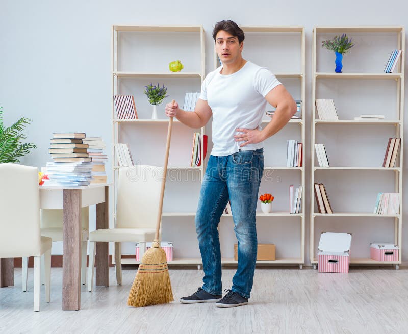 Man doing cleaning at home stock photo. Image of housework - 176607442