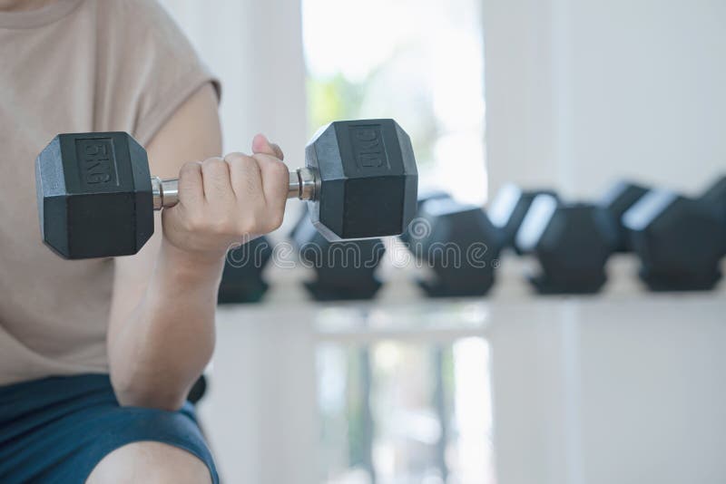 Man Doing Concentration Curls Exercise Working Out with Dumbbell Stock ...