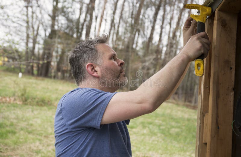 Man doing construction stock image. Image of trees, working - 59537429