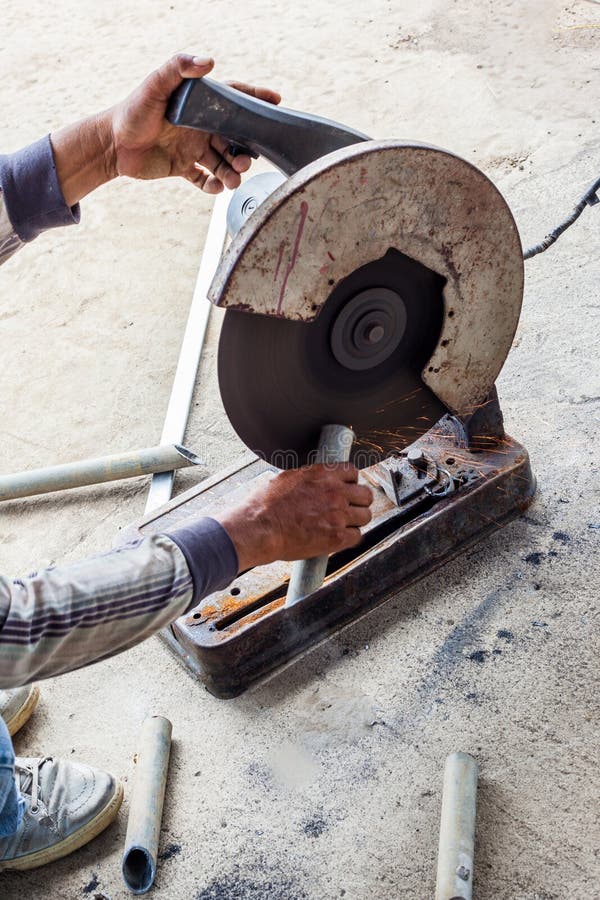 A man doing cut steel stock photo. Image of iron, cuts - 32247216