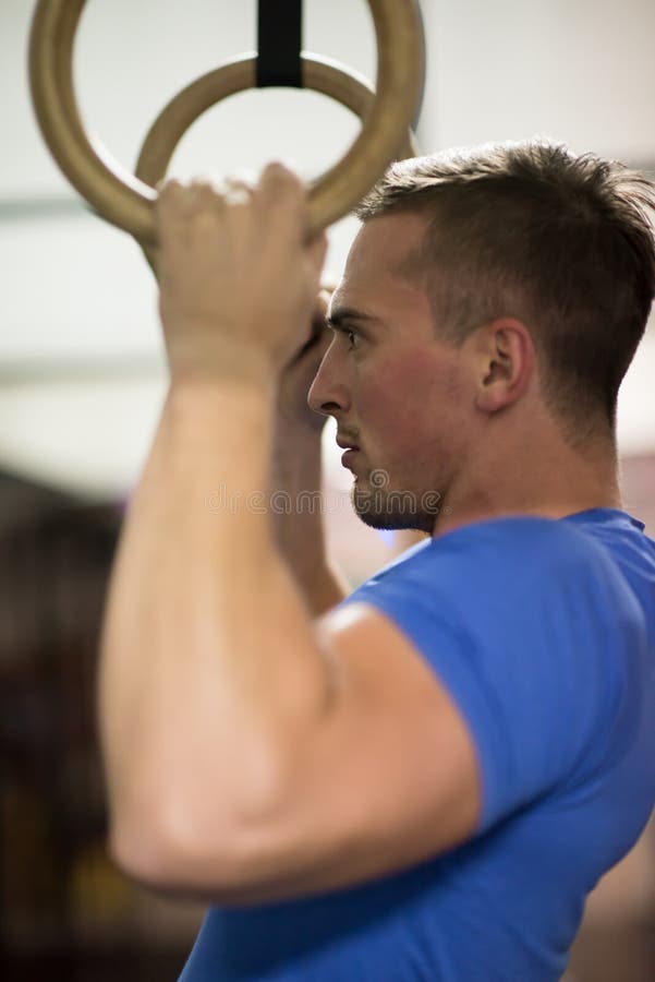 Man doing dipping exercise stock photo. Image of dangling - 88245110