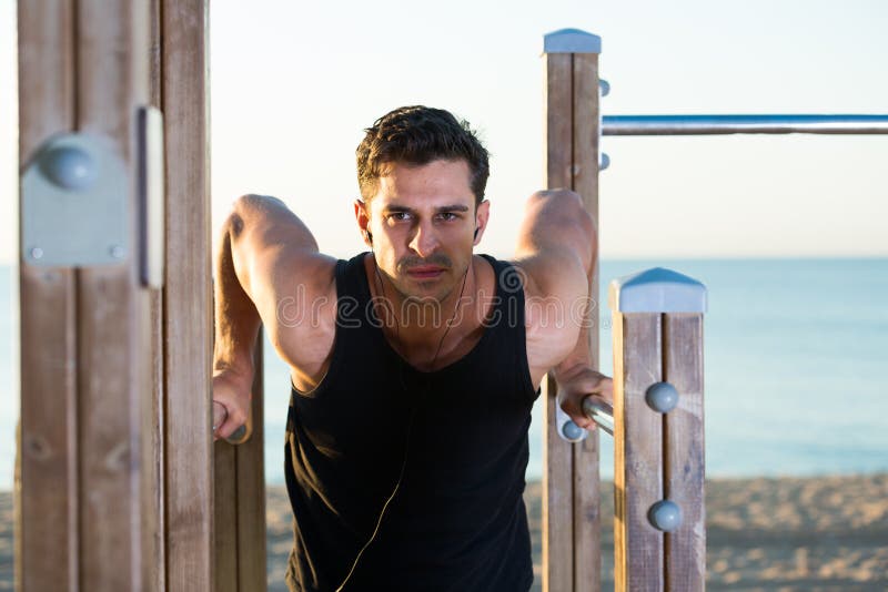 Man Doing Dips on Parallel Bars Stock Photo - Image of 3035 ...