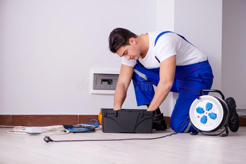Worker Installing Electrical Wiring Stock Image - Image of professional ...