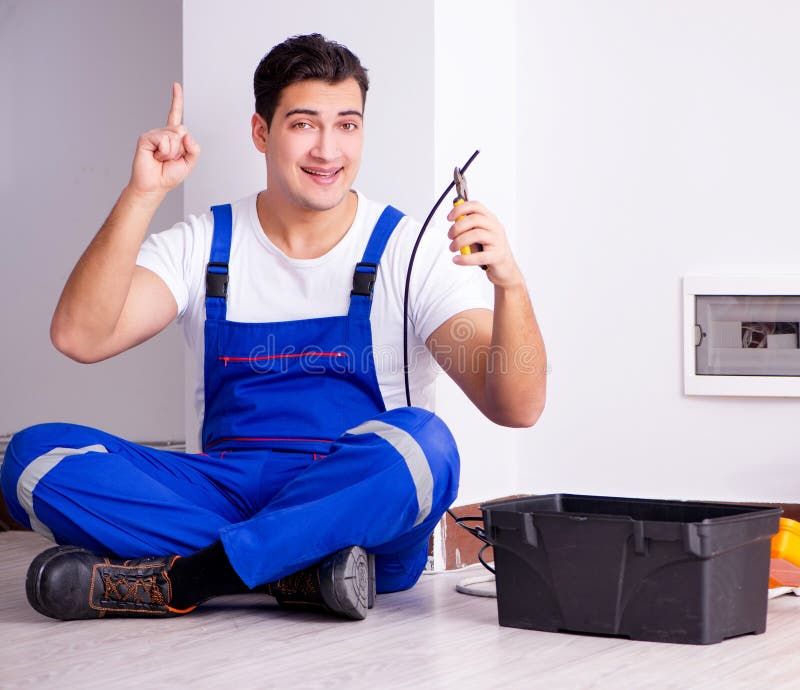 Man Doing Electrical Repairs at Home Stock Photo - Image of electricity ...