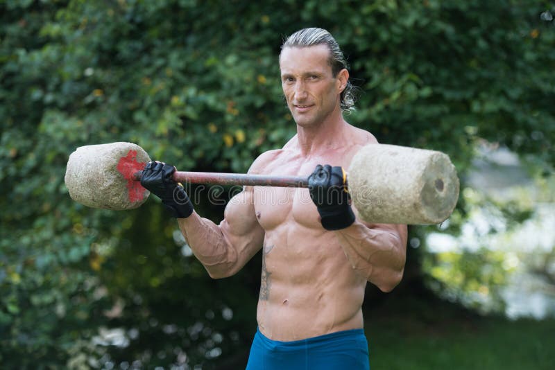 Man Doing Exercise for Biceps Outdoors Workout Stock Image - Image of ...