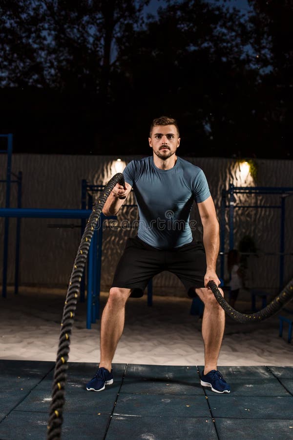 Man Doing Exercise with Rope Stock Photo - Image of male, balance ...