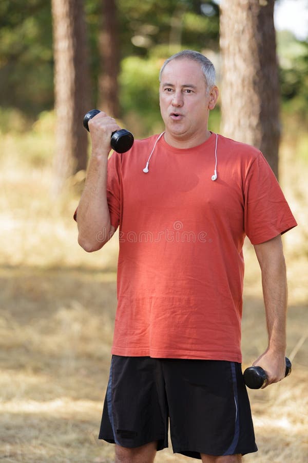 Man doing exercise outside stock photo. Image of hair - 20396964