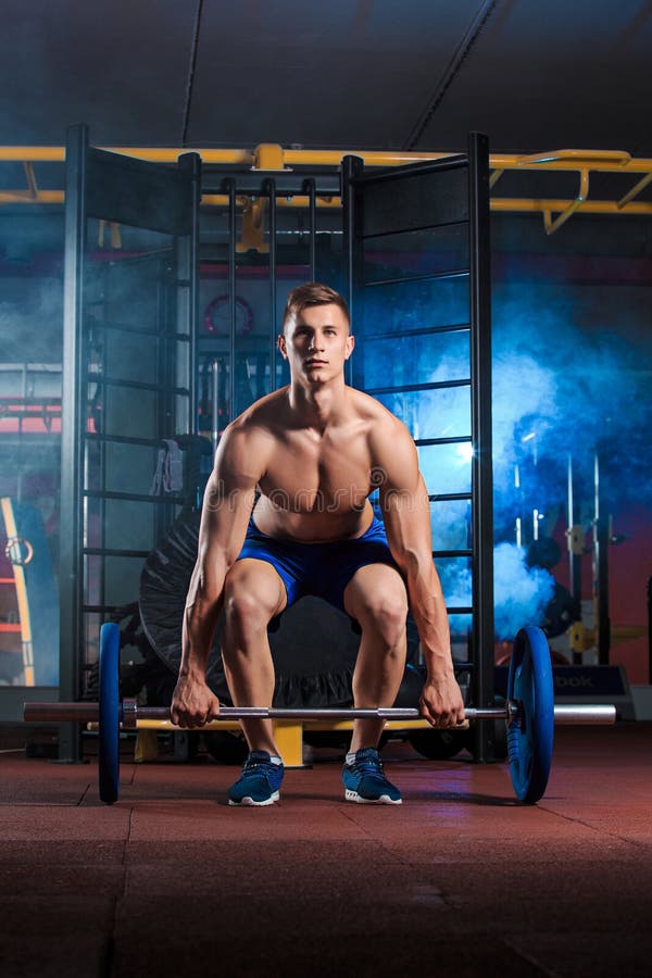 Man Doing Exercises with Barbell Stock Photo - Image of muscular ...