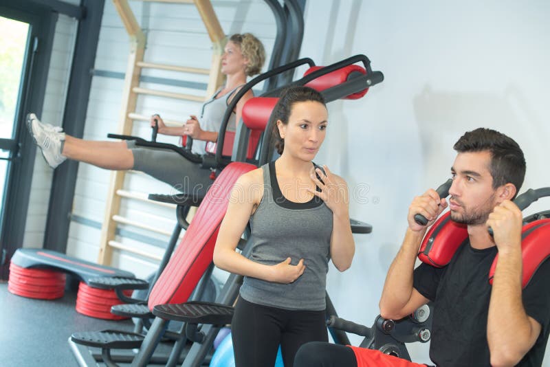 Man Doing Exercises with Female Coach Stock Photo - Image of coach ...