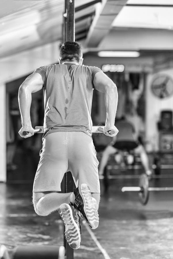 Man Doing Exercises Parallel Bars Stock Photo - Image of heavy ...