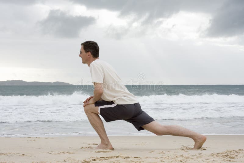 Man Doing Fitness Exercises on a Beach Stock Image - Image of health ...