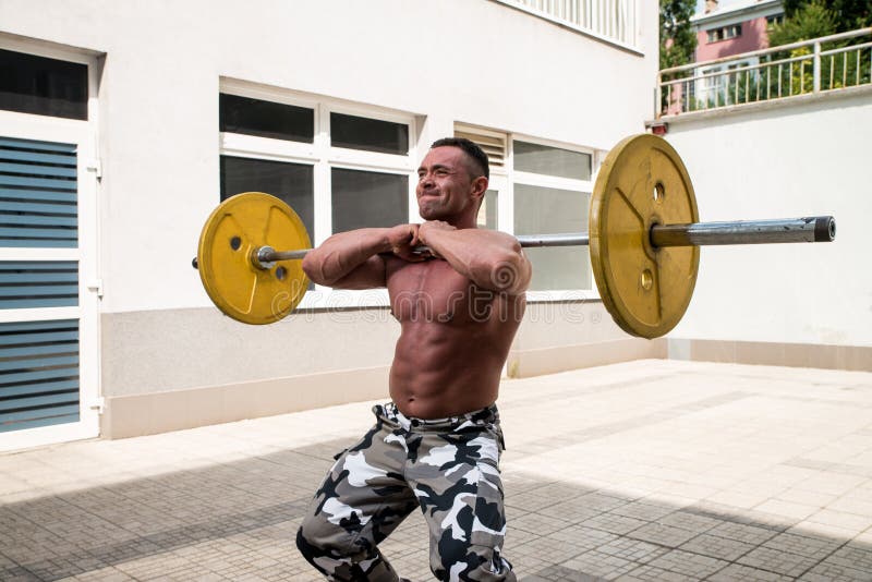 Man Doing Front Squats stock photo. Image of exercises - 33973268