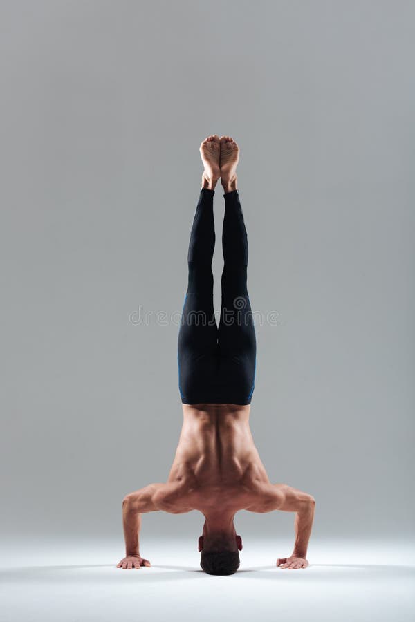 Man doing headstand stock image. Image of flexible, flexibility - 71853601