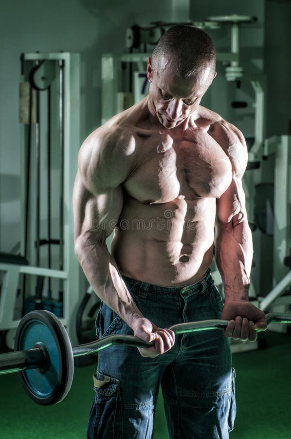 Man Doing Heavy Barbell Exercise Stock Photo - Image of determination ...