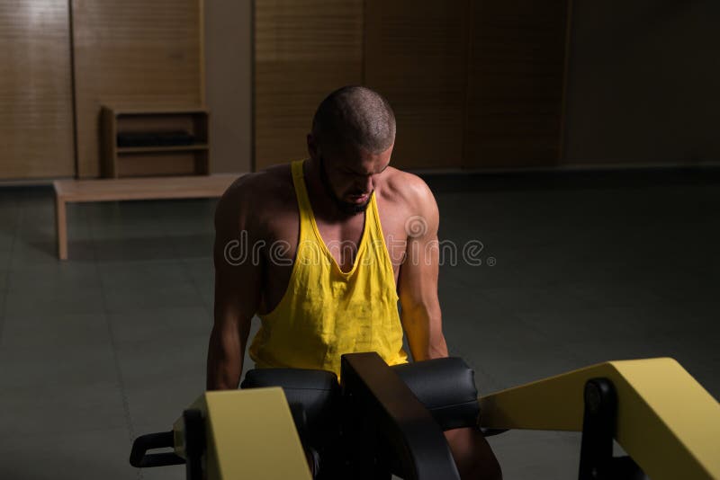 Man Doing Heavy Weight Exercise for Trapezius Stock Image - Image of ...