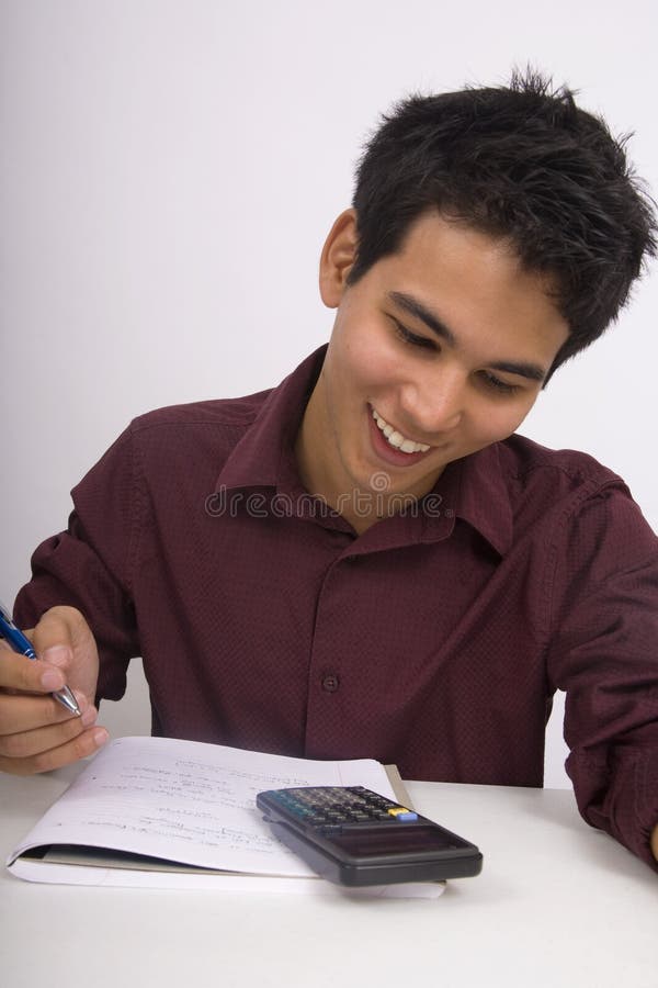 Man doing his homework stock image. Image of handsome - 7850915