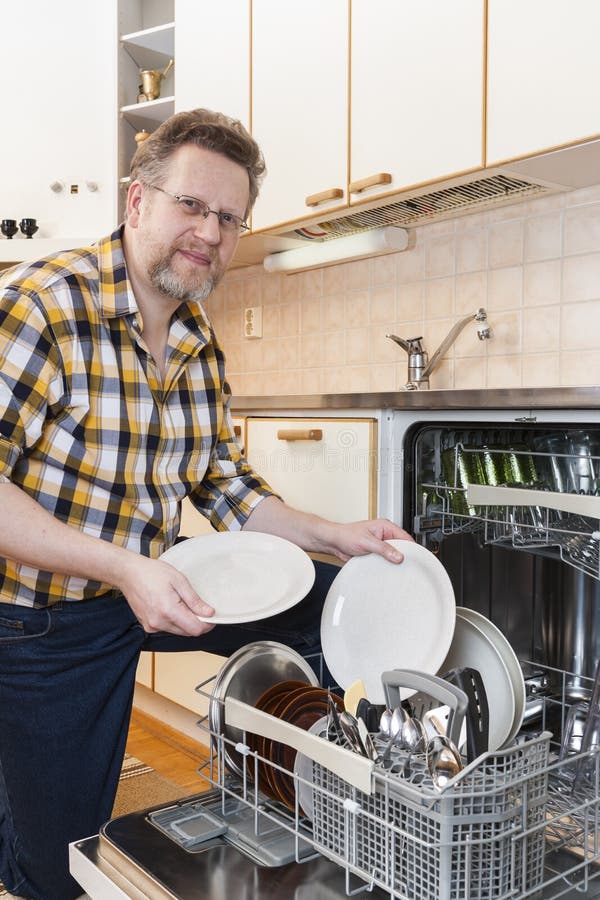 Men doing household chores stock image. Image of domestic - 35910705