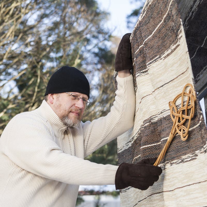 Man doing household chores stock photo. Image of beater - 50458370