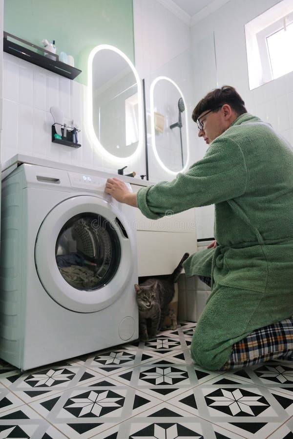 Man Doing Laundry Bathroom Loading Washer Clothes Stock Photos - Free ...