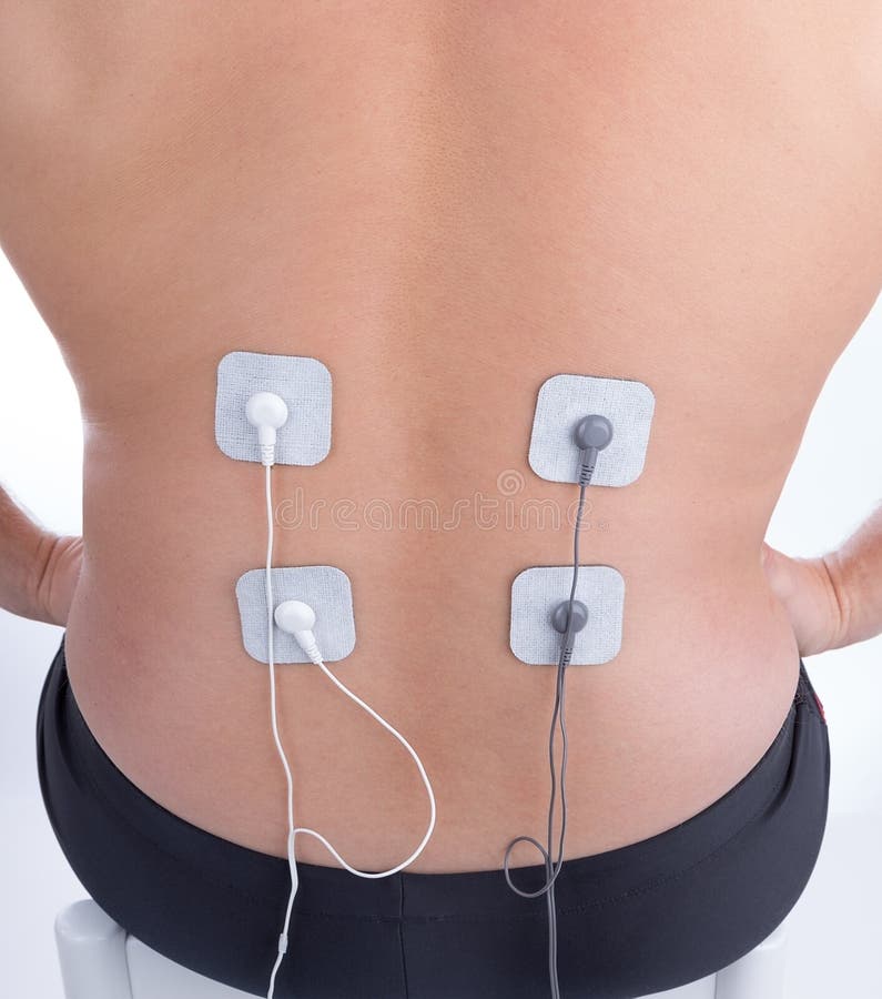 Man is Doing Massage of Electrostimulator for the Spine. Stock Image ...