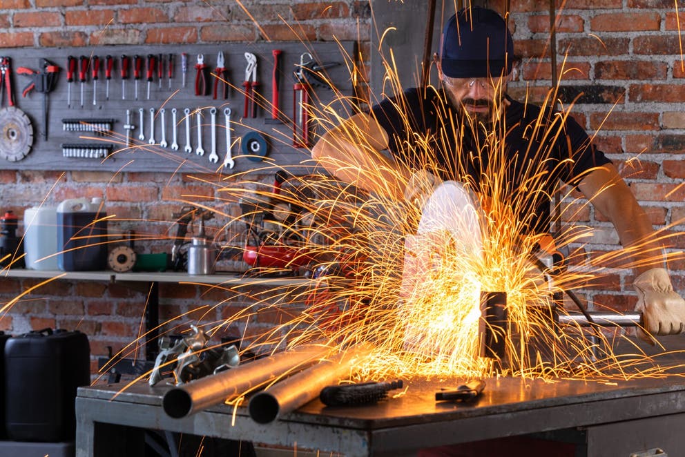 Man Doing Metalwork in a Workshop Stock Image - Image of component ...