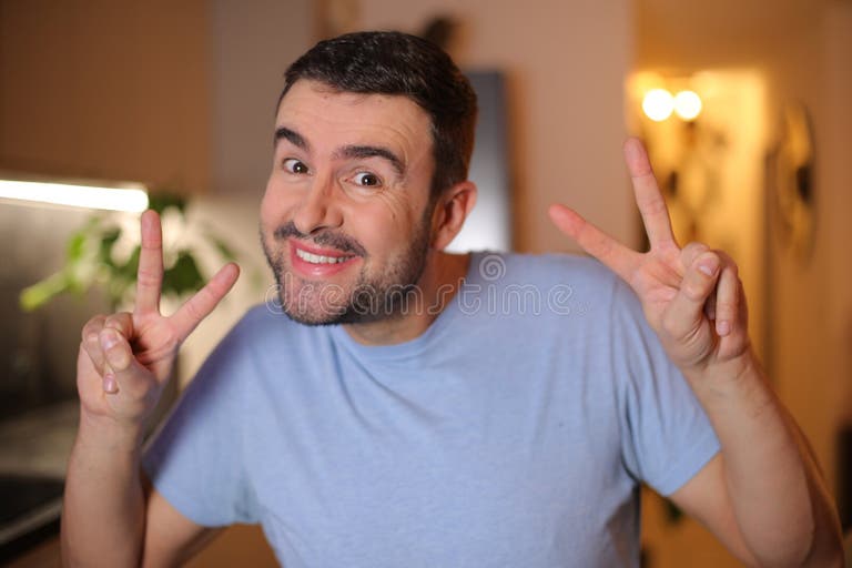 Man Doing the Peace Sign Gesture with Two Hands Stock Image - Image of ...