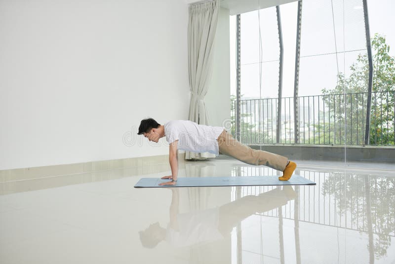 Man Doing Plank Exercise at Home - Image Stock Image - Image of athlete ...