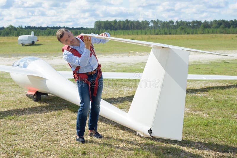 Man Doing Preflight Check Around Glider Stock Image - Image of hobby ...