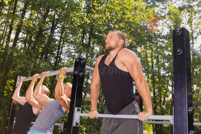 Man doing pull-ups stock image. Image of effort, outdoor - 88642759