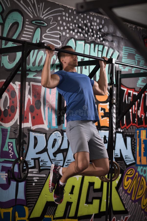 Man doing pull ups stock image. Image of adult, active - 88687443