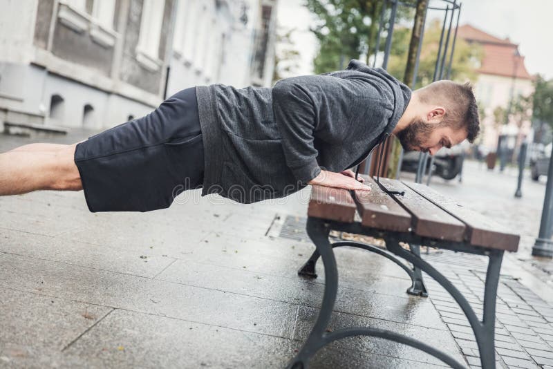 Man Doing Push-ups on a Bench. Stock Image - Image of athlete, athletic ...
