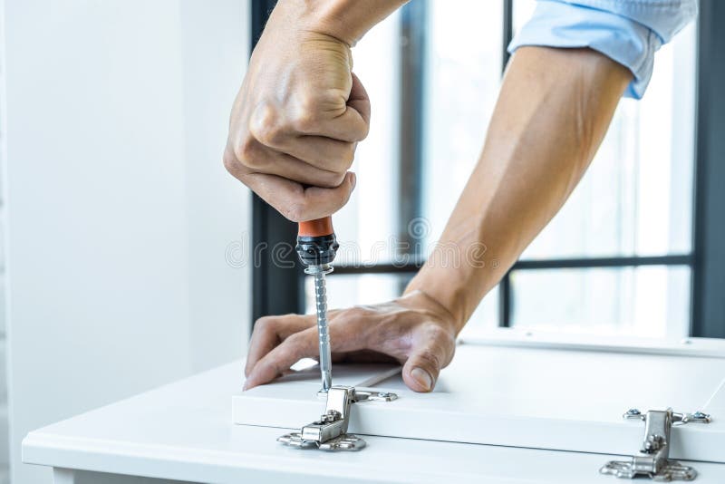 Man Doing Renovation Work at Home with Screwdriver Drill Wood Nail ...