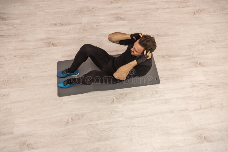 Man Doing Sit-ups stock image. Image of fitness, active - 165079207