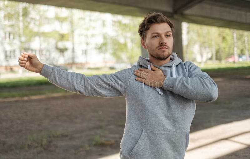 Man Doing Street Workout Alone in a City Stock Photo - Image of active ...