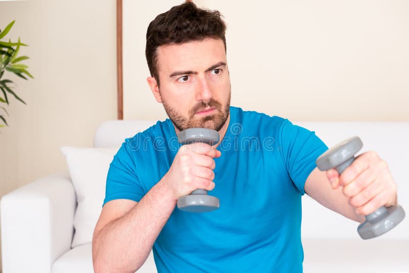 Man Doing Body Exercise and Working Out at Home Stock Image - Image of ...