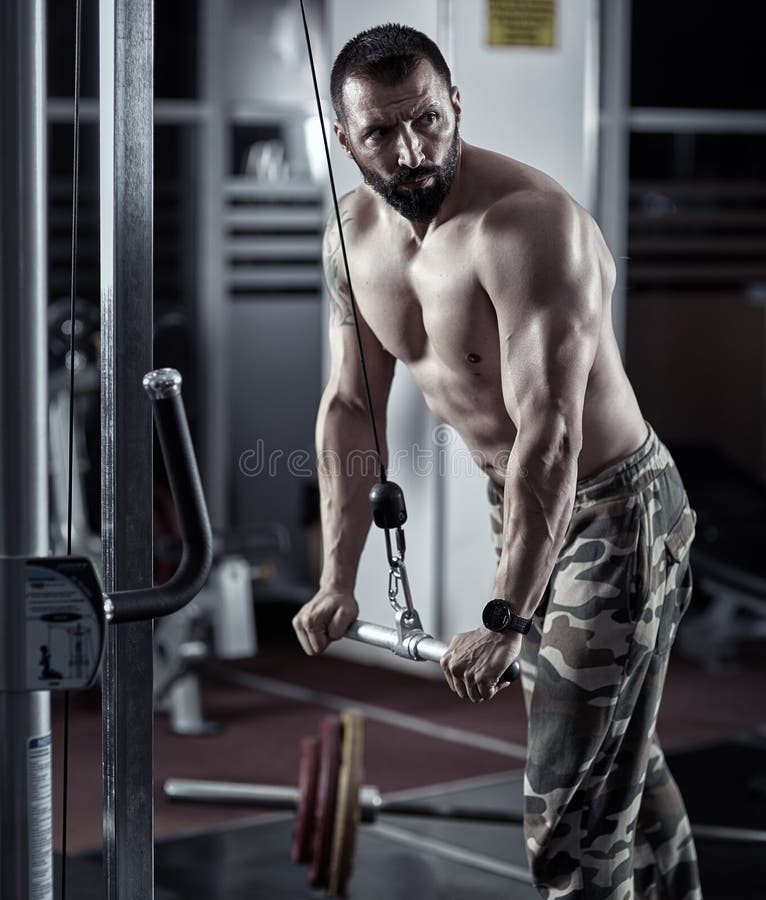 Man doing triceps workout stock image. Image of muscles - 105367549
