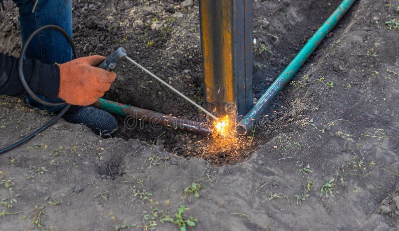 A Man Doing Welding Work. Selective Focus Stock Image - Image of ...